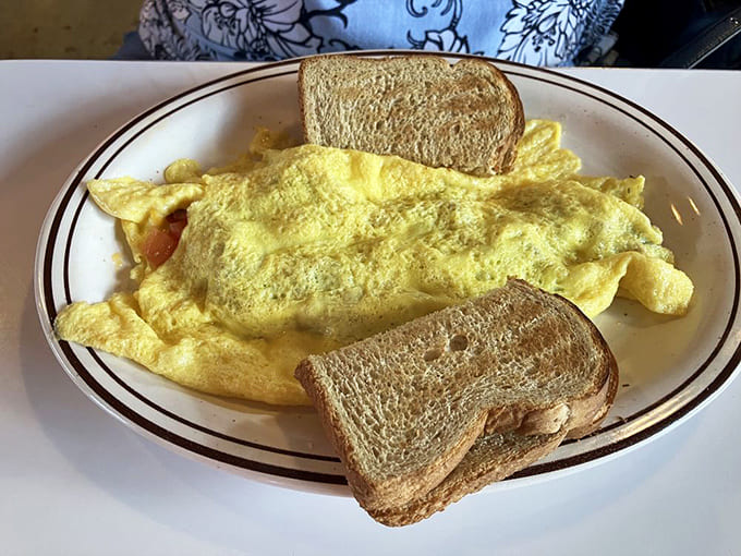 Fluffy eggs folded around savory fillings, flanked by perfectly toasted bread&mdash;breakfast doesn't get more classically comforting than this.