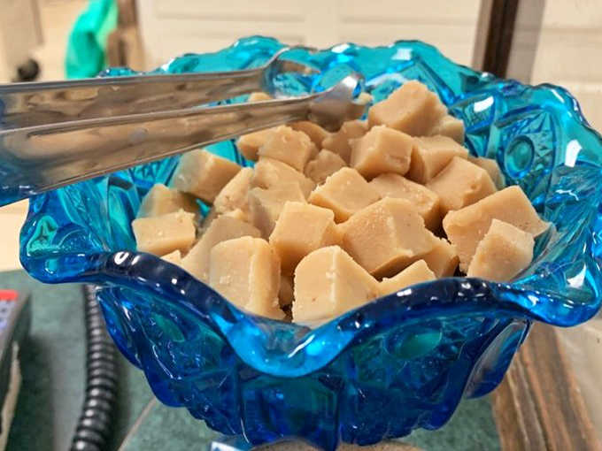 Creamy, dreamy peanut butter fudge cubes nestled in a vintage blue glass dish &ndash; like edible gold for those who know what really matters in life.