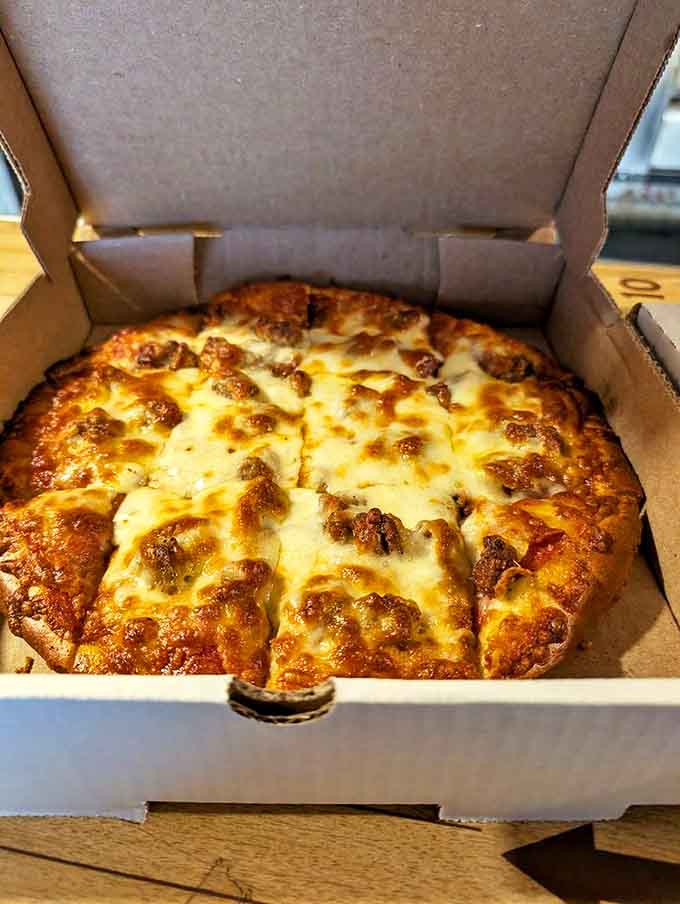 This pepperoni and sausage masterpiece features those perfect little cups of crispy-edged pepperoni that collect flavor-packed oils.