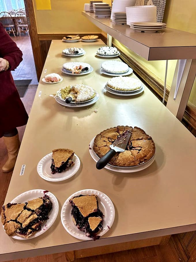 Pie paradise! Flaky crusts cradle sweet fillings topped with powdered sugar &ndash; the kind of desserts that make you consider skipping the main course.