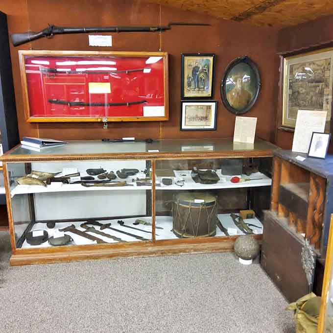 Glass cases protect treasures that survived centuries, from weapons that defended homesteads to everyday items that made pioneer life possible.