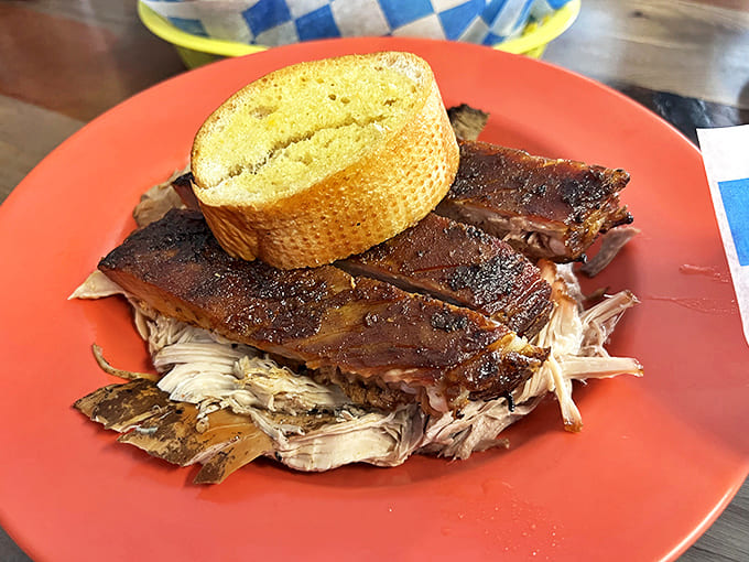 A mountain of tender pulled pork crowned with ribs &ndash; proof that sometimes more really is more.