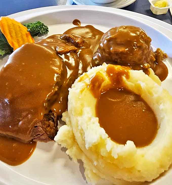 A gravy lover's dream come true &ndash; tender beef smothered in rich, savory goodness that cascades over mashed potatoes.