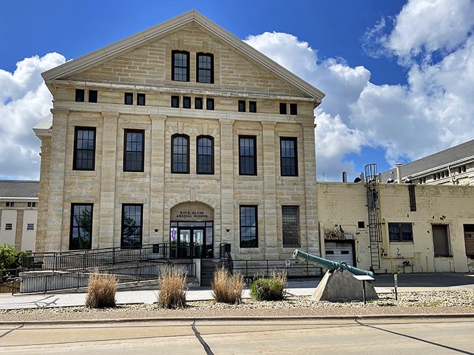 The Rock Island Arsenal Museum stands proud in limestone dignity, housing centuries of military history behind its stately facade.