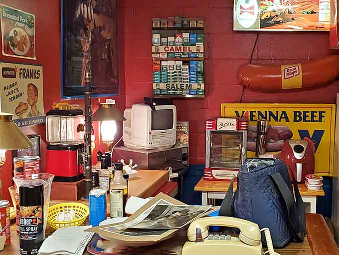 Vintage advertising signs and retro appliances create a time capsule of American consumer culture when products were built to last generations.