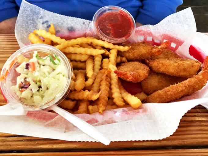 Golden-brown shrimp that snap between your teeth, crispy fries, and creamy coleslaw &ndash; seafood this good feels like a delicious secret in hot dog country.