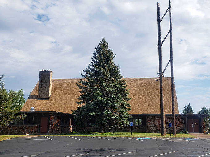 St. John's Catholic Church stands as a steadfast landmark, its rustic stone architecture reflecting the solid, dependable character of North Shore communities.