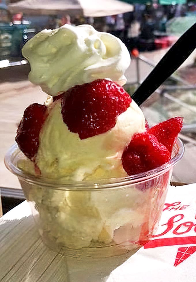 Strawberry Ice Cream: Fresh berries nestled in cream so white it practically glows &ndash; nature's perfect partnership in a cup.