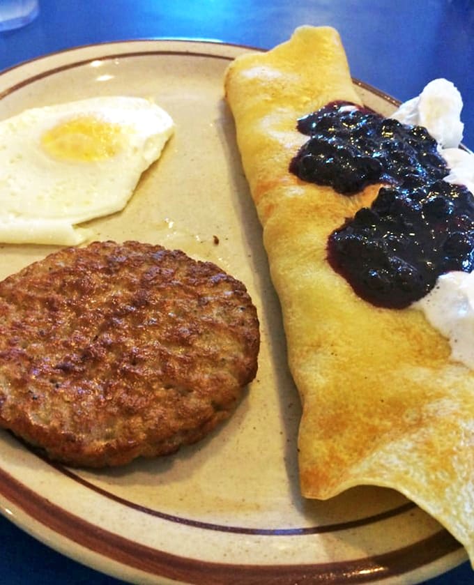 Swedish pancakes meet fresh fruit in a harmonious breakfast symphony that hits all the right notes of sweet, tart, and buttery goodness.