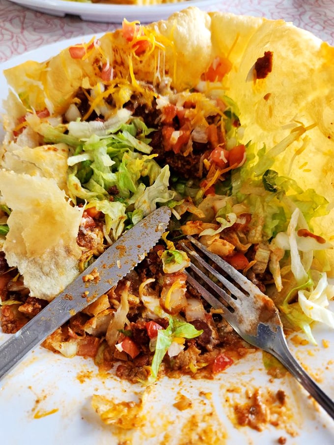 This taco salad isn't just a meal, it's edible architecture—a crispy tortilla fortress protecting a treasure of seasoned beef, cheese, and fresh veggies.