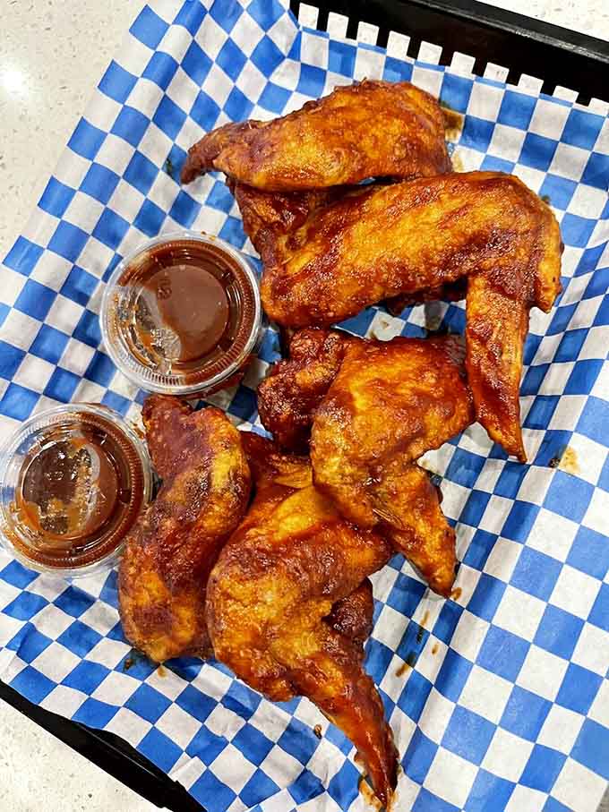 Golden wings with sauce on the side prove this diner knows its way around more than breakfast.