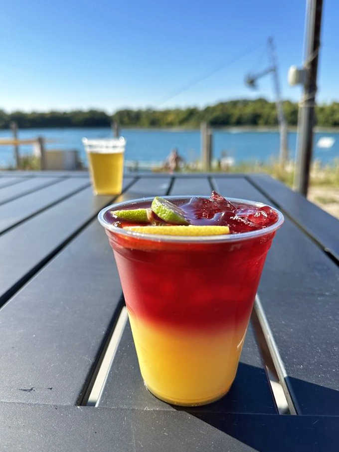 This layered sangria looks like a sunset decided to take a swim in your glass and brought all its fruity friends.