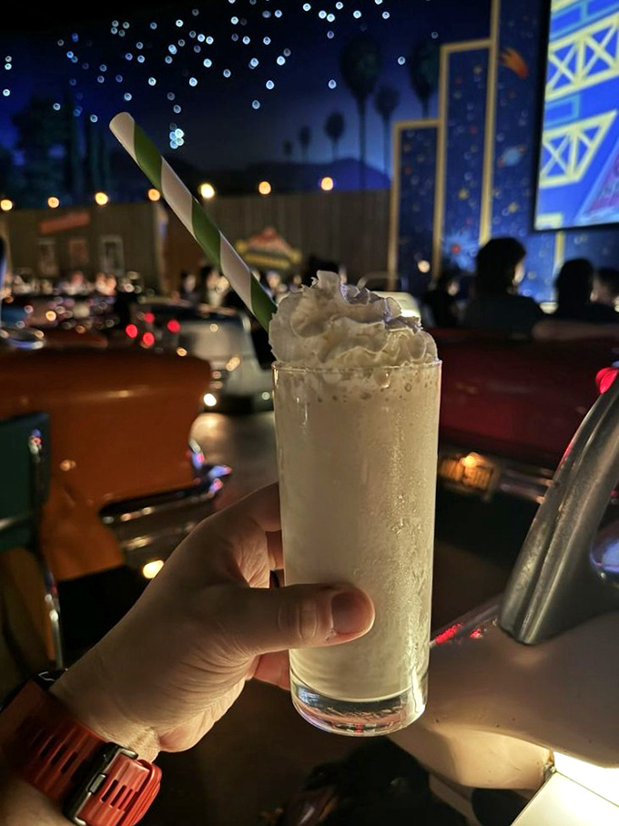 The milkshake arrives tall and proud, topped with whipped cream and probably more calories than a moon landing requires, but absolutely worth the journey.