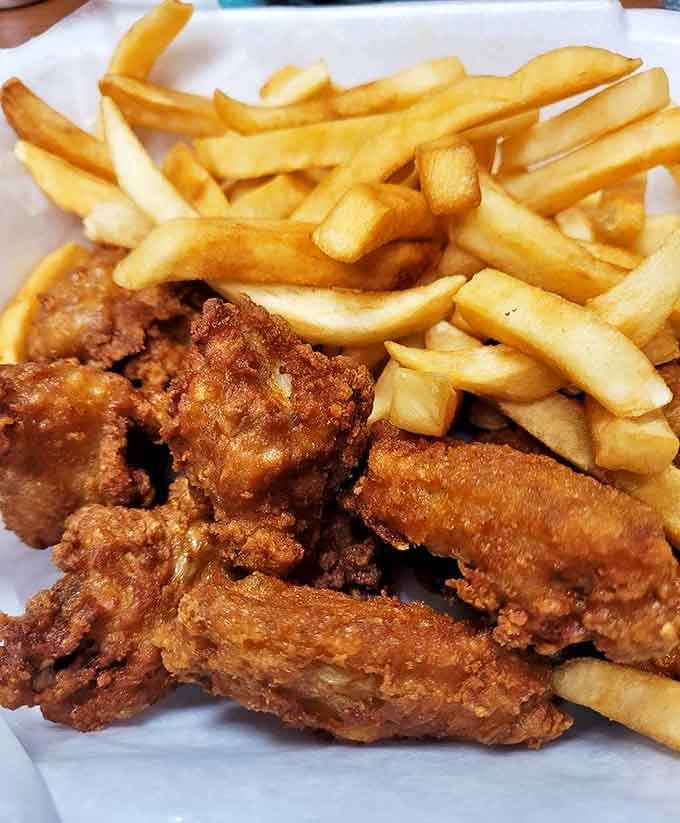 Golden-brown wings and perfectly crisp fries &ndash; the kind of simple pleasure that makes you wonder why anyone bothers with fancy food.