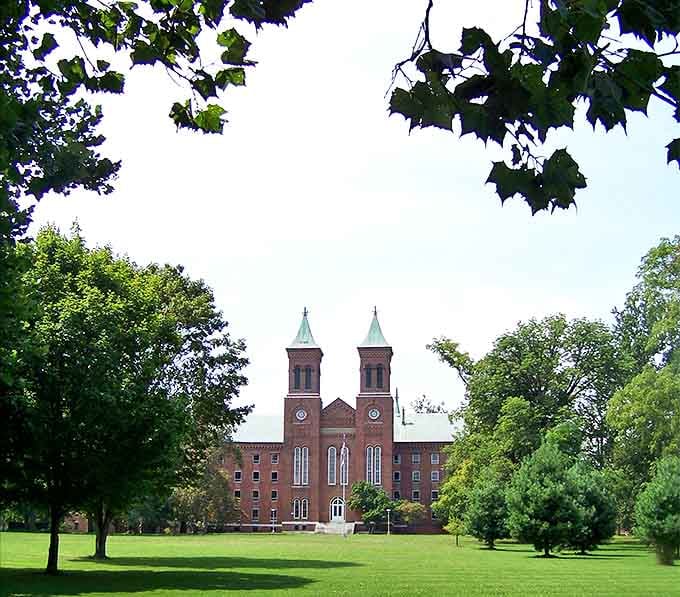 Antioch College's twin-spired building stands as an architectural anchor in Yellow Springs, its brick facade telling stories of progressive education and community values.