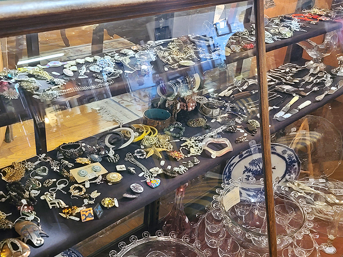 Gleaming under display lights, vintage jewelry and collectibles sparkle with history &ndash; each brooch and bauble waiting to adorn a new generation.