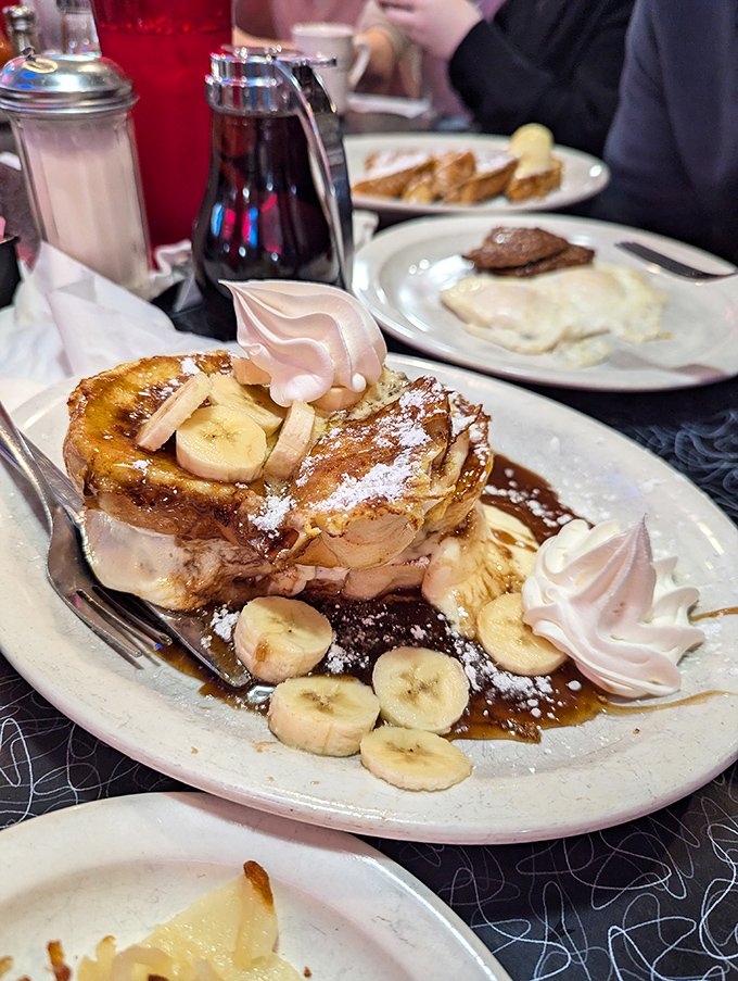 Brioche French toast transformed into dessert-for-breakfast heaven with caramelized bananas and dollops of whipped cream that dance on the tongue.