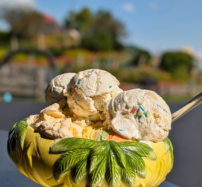 Sweet tropical indulgence! The signature "Lava Flow" ice cream sundae served in a pineapple bowl makes for a perfect mid-adventure treat.