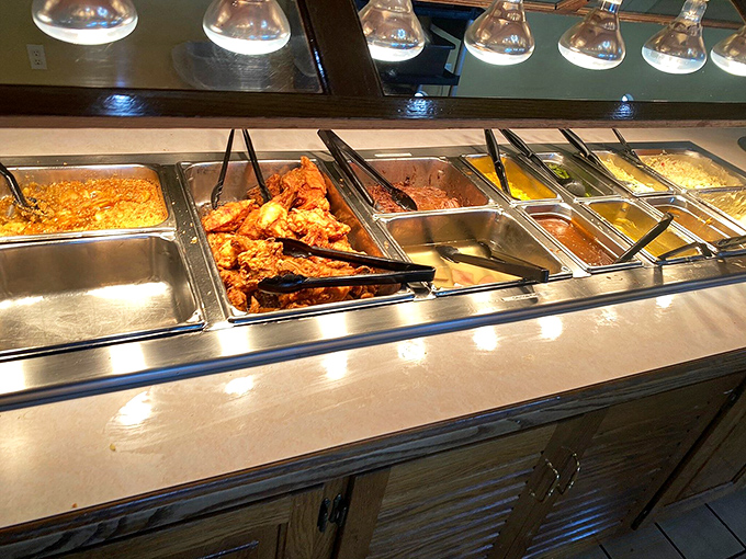 The buffet line stretches like a runway of comfort food &ndash; each steam tray promising a different journey into flavor country without requiring a passport.