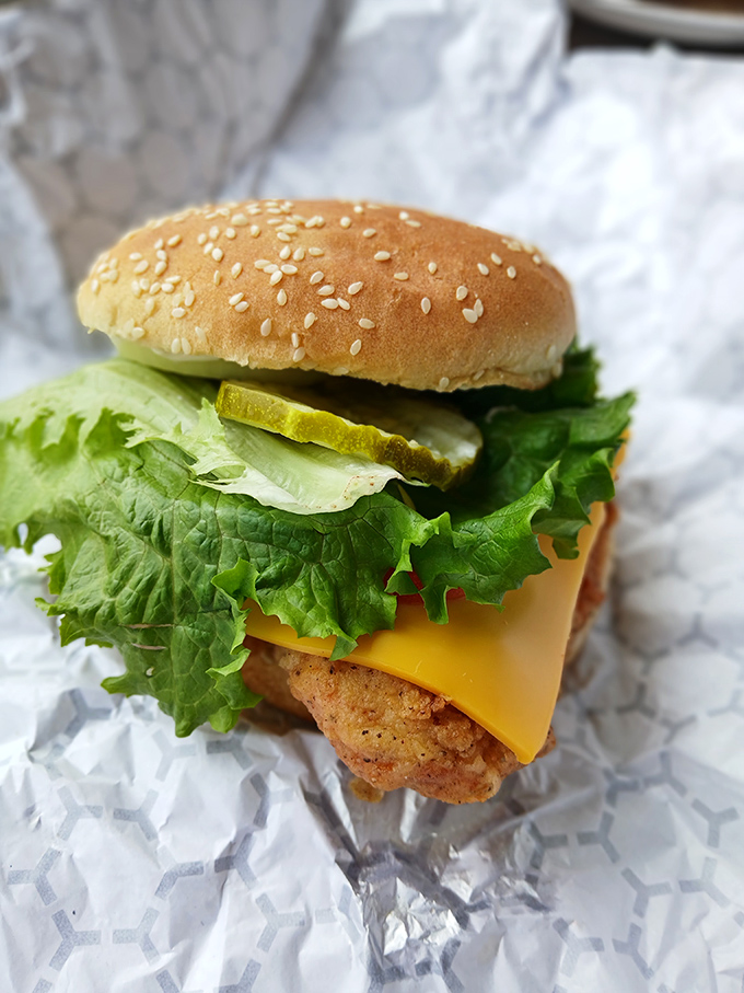 This isn't just any chicken sandwich &ndash; it's the result of decades of perfecting the art of frying, nestled in a soft bun with fresh fixings.