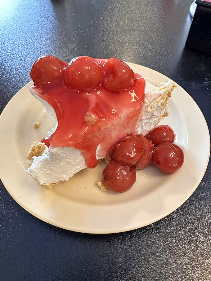 Cherry cheesecake that strikes that perfect balance between sweet and tart – like summer sunshine captured on a plate.