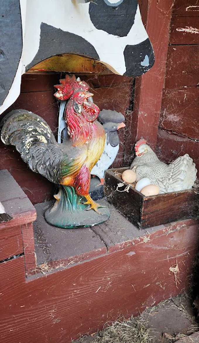 Inside this miniature barn, ceramic roosters and hens gather around egg-filled nests &ndash; farmyard bathroom humor at its finest.
