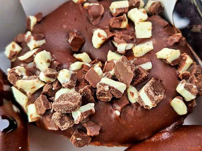 Chocolate lovers rejoice! This decadent creation topped with chocolate chunks proves that sometimes the best things in life really do come in small packages.