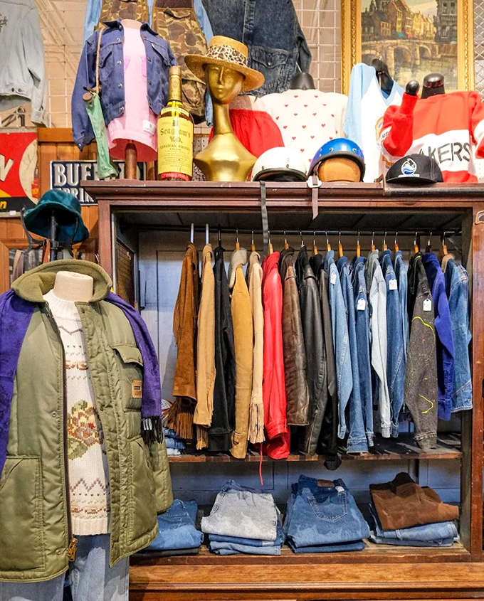 Vintage clothing racks burst with authentic fashion history &ndash; each garment representing an era when style had staying power.
