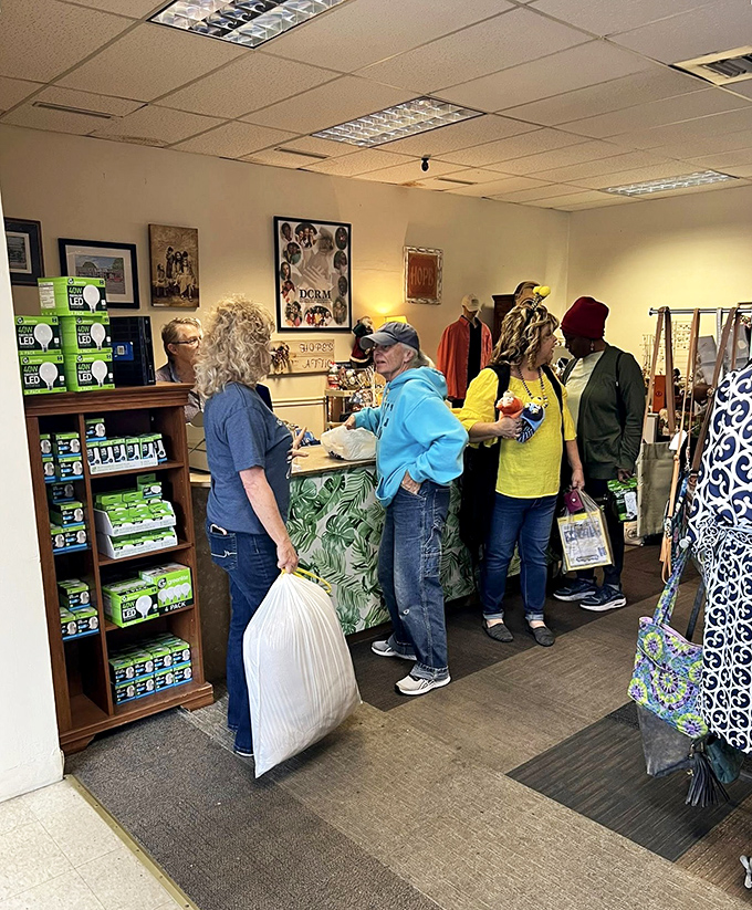 The checkout area buzzes with activity as shoppers complete their treasure hunts, each bag filled with unique finds.