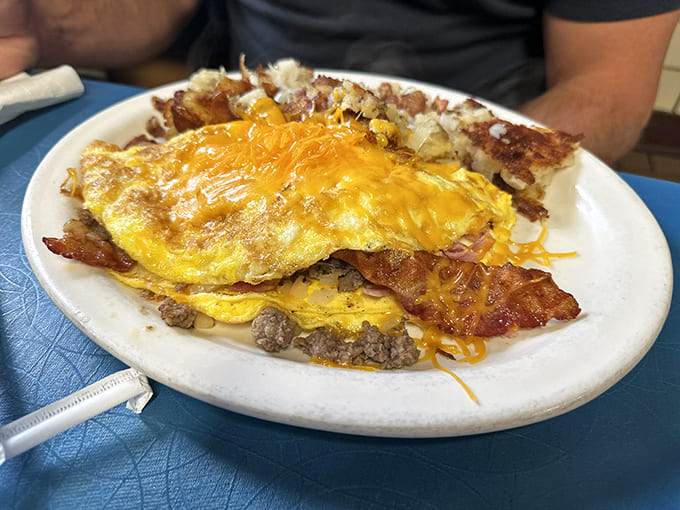 Breakfast perfection on a plate &ndash; this hearty omelet bursting with cheese, meat and potatoes could fuel a marathon or cure a hangover.