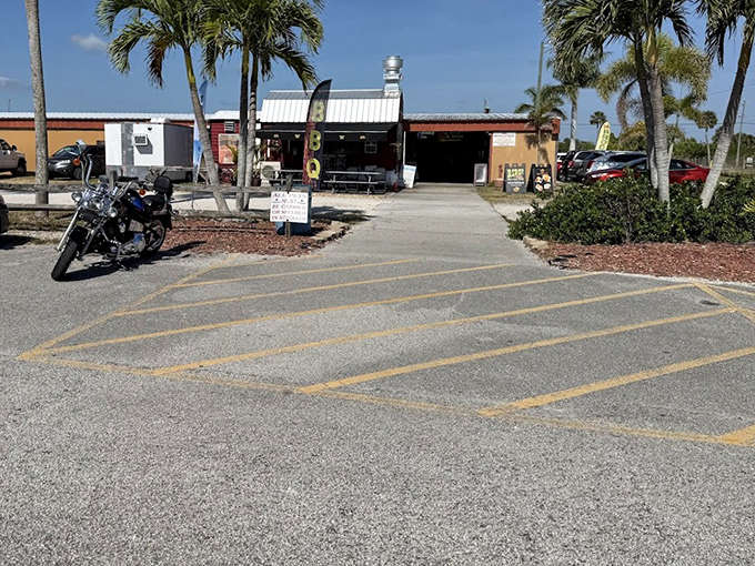 Even the parking lot has character here, with motorcycles and palm trees suggesting this isn't your average strip mall shopping experience.