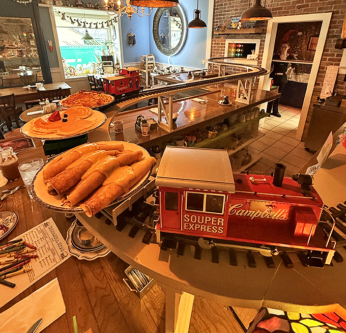 Golden, fluffy pancakes studded with plump blueberries &ndash; proof that this kitchen takes its breakfast classics as seriously as its train delivery.