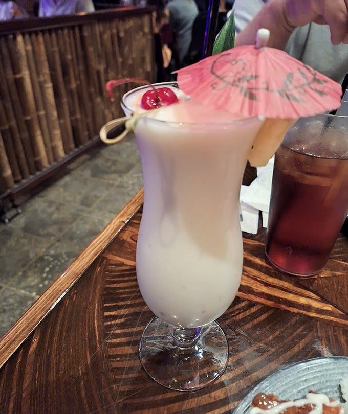 A Pi&ntilde;a Colada that doesn't just taste like vacation &ndash; it looks the part too, complete with the mandatory tiny umbrella.