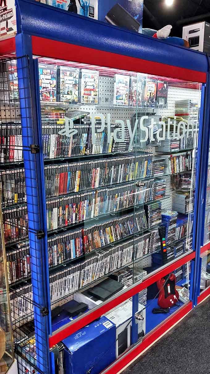 The PlayStation collection spans generations of gaming evolution, each case representing countless hours of adventures waiting to be relived.