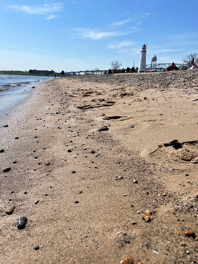 The shoreline curves gently along Lake Huron, creating that postcard-perfect scene that makes your friends question whether you've secretly moved to the Caribbean.
