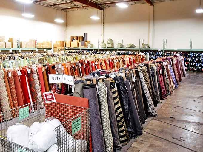 The fabric organization here is so satisfying it could have its own ASMR channel, with rolls stacked like a textile version of Tetris perfection.