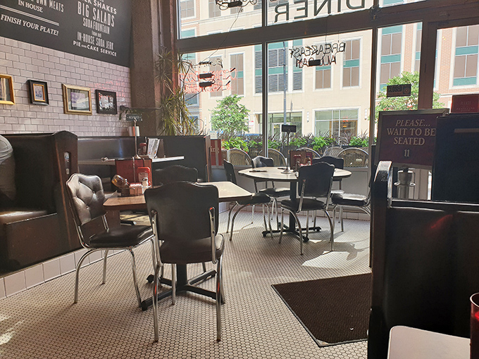 Natural light floods Eleven City Diner's interior, highlighting comfortable seating perfect for lingering over coffee and conversation.