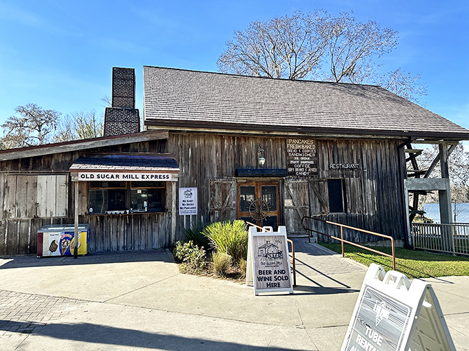 Old Sugar Mill's weathered wooden structure houses the famous make-your-own pancake restaurant. The historic building sits beside tranquil De Leon Springs.