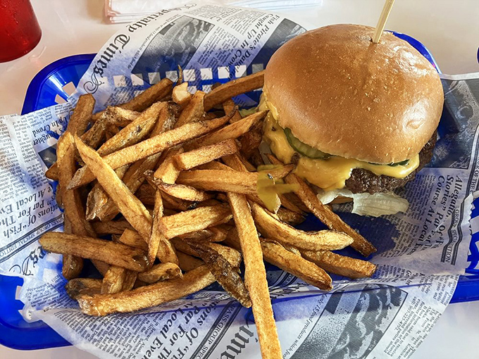 This isn't just a burger – it's a hand-formed masterpiece requiring both hands, multiple napkins, and zero regrets about the calories.