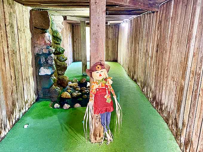 A whimsical wooden passageway where mini-golfers encounter a straw-stuffed greeter who's seen thousands of terrible putts and keeps all secrets.