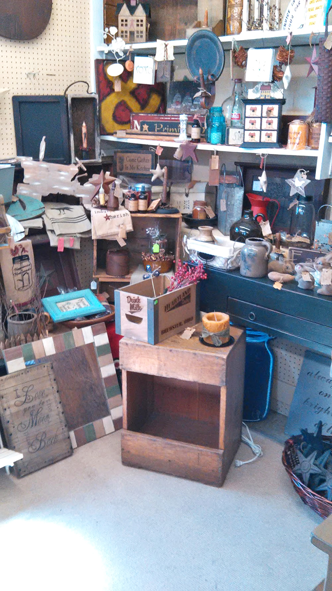 Antique oil lamps and colorful glassware catch the light like jewels, proving that functional items from bygone eras understood that beauty and utility should always go hand in hand.