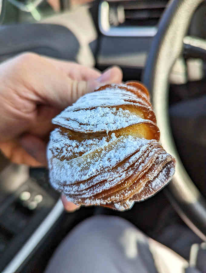 The sfogliatella&mdash;a pastry so perfectly flaky it practically whispers "buongiorno" with each delicate, powdered-sugar dusted bite.