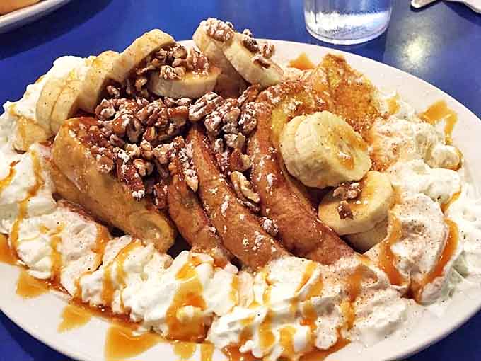 Banana Foster French Toast that makes you want to write poetry: thick-cut sourdough transformed into a caramelized banana paradise that defies breakfast categorization.