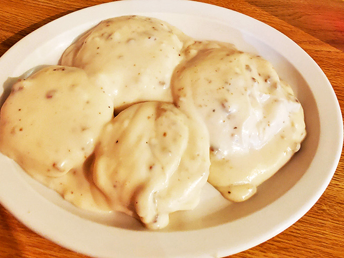 Fluffy clouds of dough baptized in pepper-flecked gravy &ndash; the kind of dish that makes you want to hug the cook and move to the Midwest.