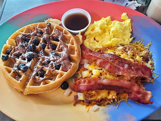 This blueberry waffle with a dollop of butter and side of maple syrup makes a compelling case for breakfast as the day's main event.