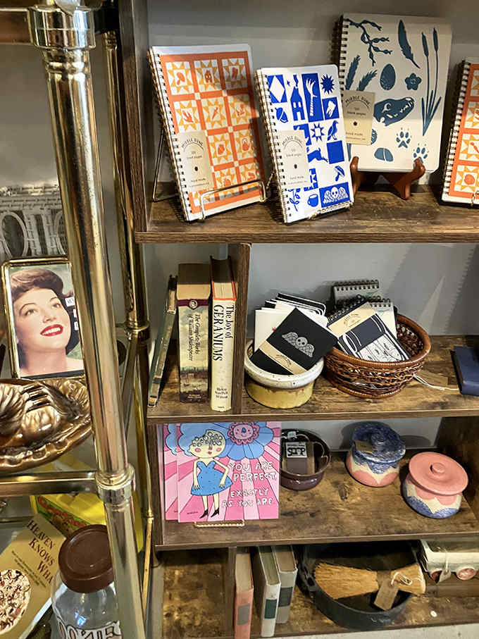 Spiral-bound nostalgia and carefully curated volumes create a corner where analog pleasures reign supreme.