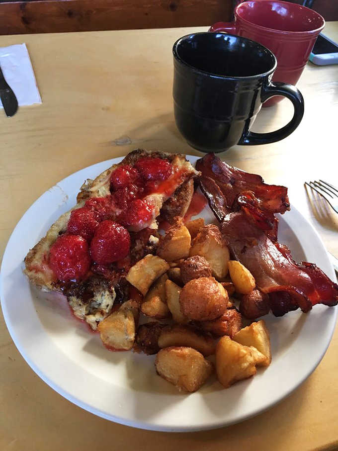 A breakfast spread that would make grandma proud, complete with crispy bacon, eggs cooked to perfection, and toast from house-baked bread.