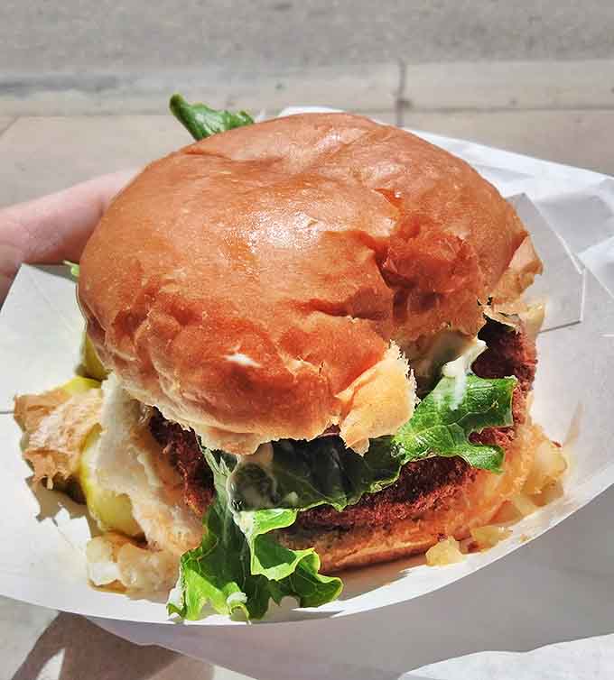 The Char Burger in all its glory &ndash; a perfectly seasoned patty with that distinctive char-grilled flavor that makes The Wiener's Circle special.