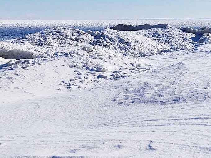 Winter transforms Lake Huron into a frozen wonderland, where ice sculptures form naturally and brave souls test their cold tolerance.