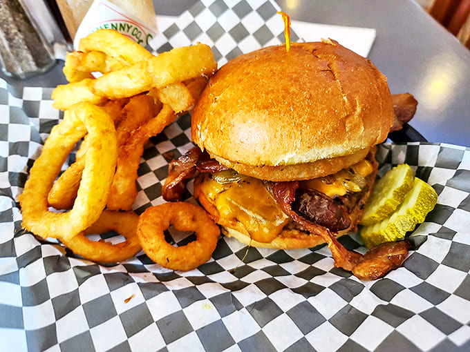 A classic cheeseburger with onion rings on the side&mdash;comfort food that doesn't need to shout to make its delicious point.